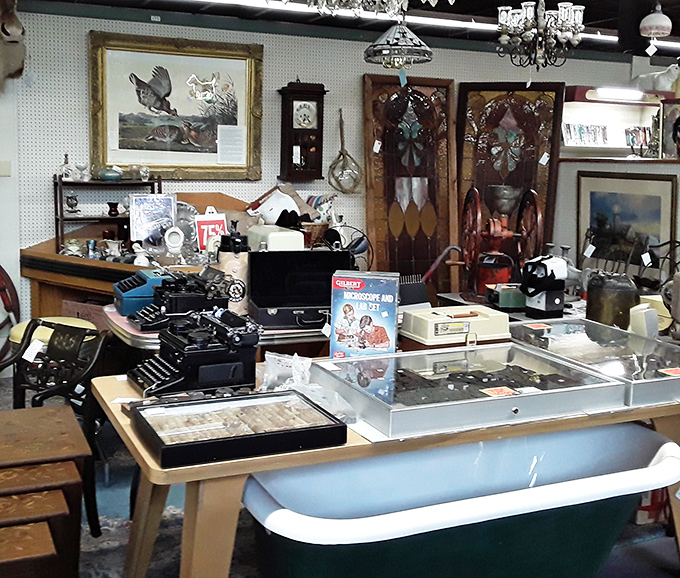 A graveyard of typewriters where the ghosts of unfinished novels linger. Hemingway would approve of that blue Underwood.