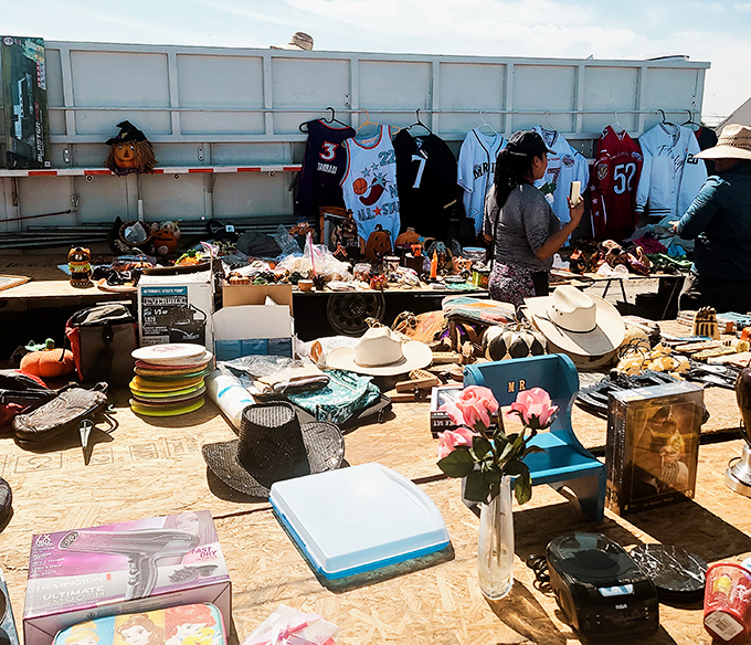 The ultimate garage sale tableau&mdash;cowboy hats neighbor vintage electronics while sports jerseys hang above mysterious gadgets of questionable purpose.