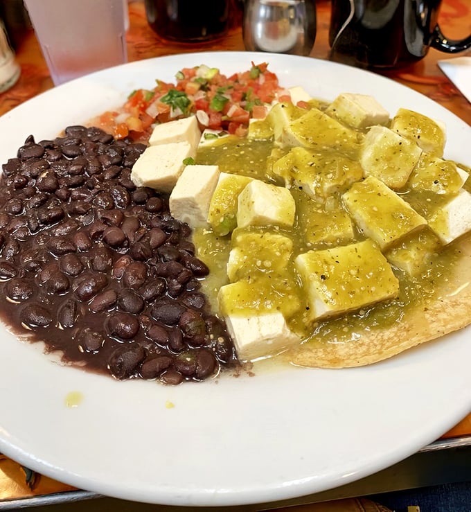 A colorful fiesta of tofu, black beans, and fresh salsa that proves plant-based eating can be both hearty and delicious.