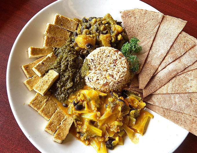 A feast for both eyes and appetite. This vibrant plate showcases the kitchen's talent for turning humble plant ingredients into an edible work of art.