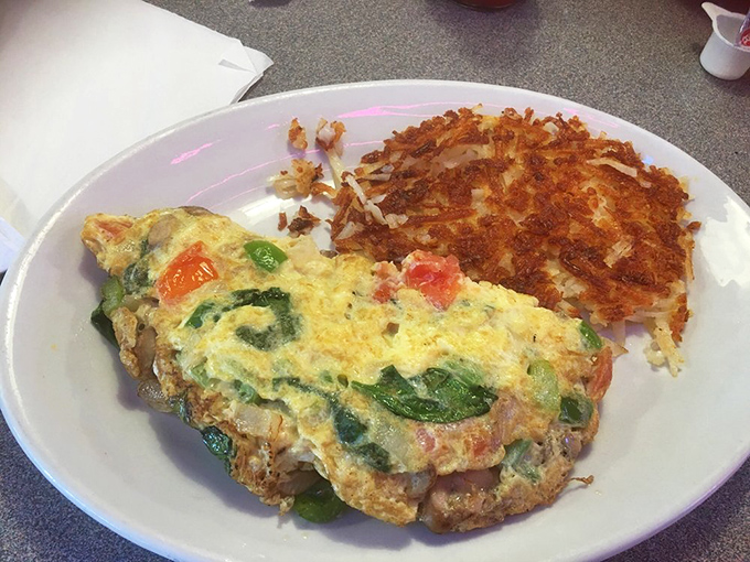 This veggie omelet proves vegetables can be more than just healthy&mdash;they can be downright indulgent when folded into fluffy eggs alongside those golden hash browns.