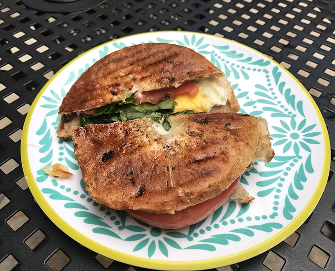 Not your average lunch counter sandwich. This panini, bursting with fresh ingredients, proves Axum takes its food as seriously as its coffee.