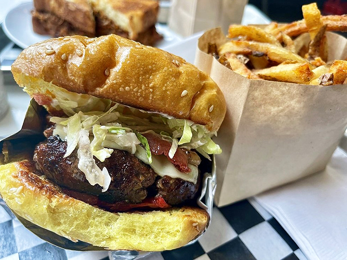 A burger and fries that would make your cardiologist wince and your taste buds sing. Worth every minute on the treadmill tomorrow.