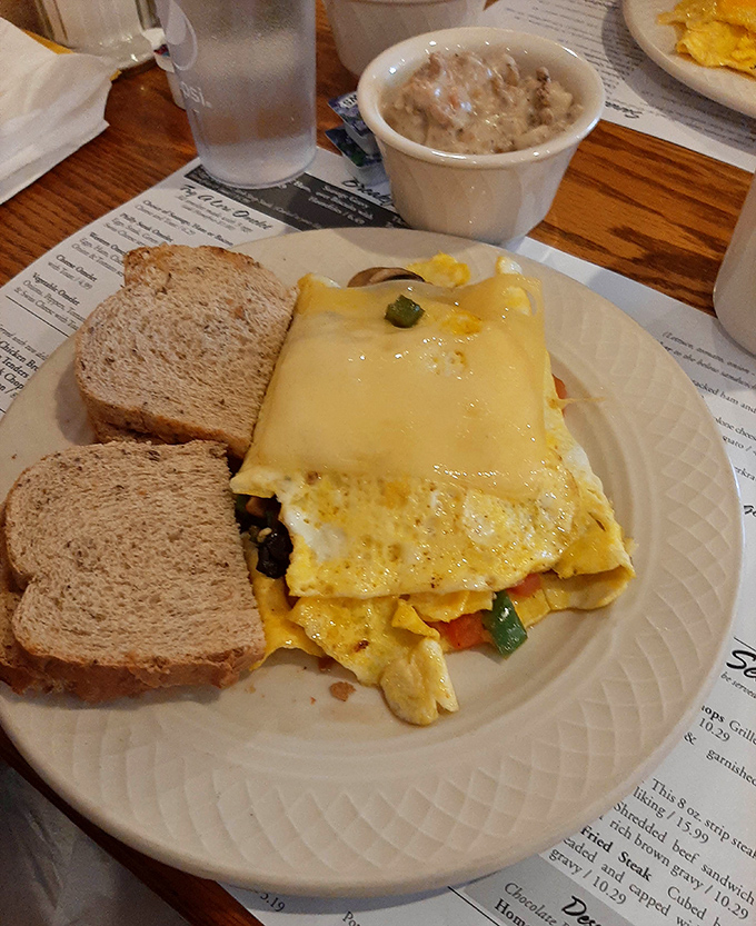 This isn't just breakfast&mdash;it's morning salvation. Cheese blankets eggs and vegetables in a harmony that makes waking up worthwhile.