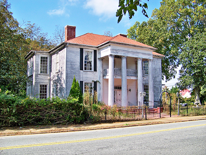 This classic Southern home with its graceful columns whispers stories of bygone eras. In Anderson, architectural history isn't confined to museums&mdash;it lines the streets you'll stroll daily.