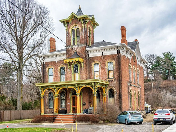 This Victorian charmer looks like it was designed by someone who believed houses, like desserts, benefit from extra decorative flourishes and a splash of color.
