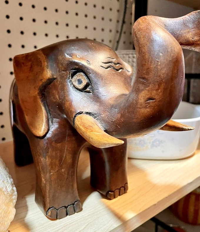 This wooden elephant sculpture has more personality and charm than most characters in today's TV shows. Those eyes have seen things!