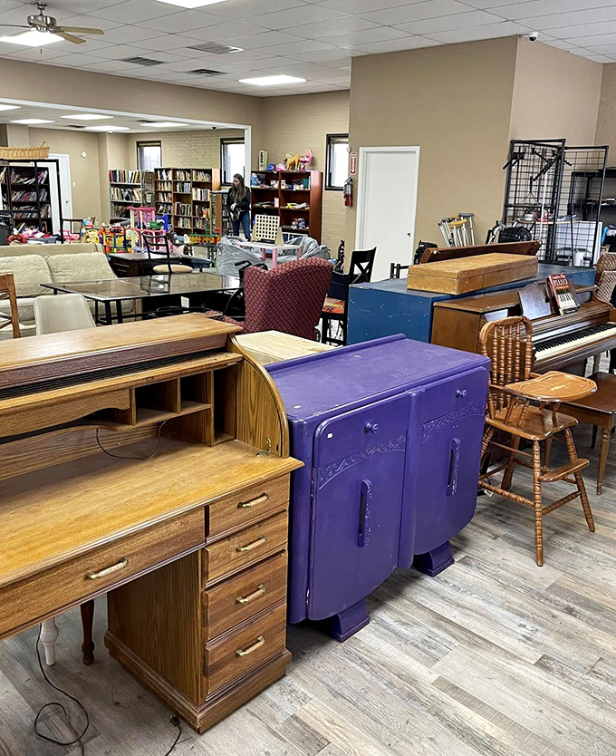 Furniture that's seen a few family dinners and has stories to tell. That purple cabinet is practically begging for a second chance.