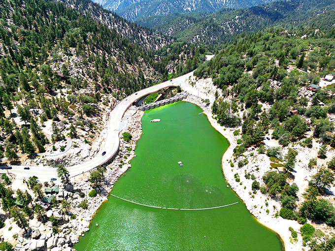 Nature's infinity pool: Big Bear Lake's emerald waters carve through mountain terrain, creating vistas that no resort architect could ever design.