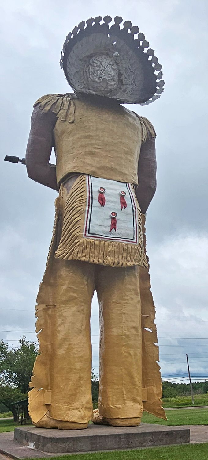 The back view reveals Hiawatha's impressive headdress&mdash;each feather the size of a kayak paddle, meticulously crafted in fiberglass.