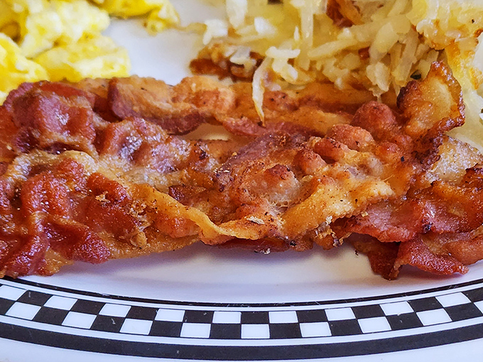 Bacon so perfectly cooked it should have its own fan club. Crispy edges, chewy center &ndash; the breakfast MVP.