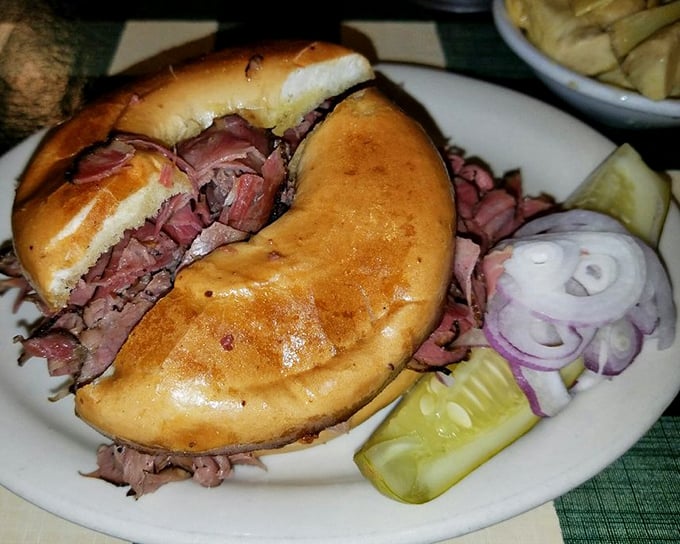 When a sandwich has this much meat, it needs reinforcements&mdash;a proper kosher dill and red onion standing guard against ordinary lunch experiences.
