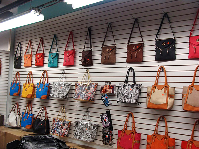 A rainbow of handbags awaits new shoulders to call home, each promising to be that perfect accessory you didn't know you needed.