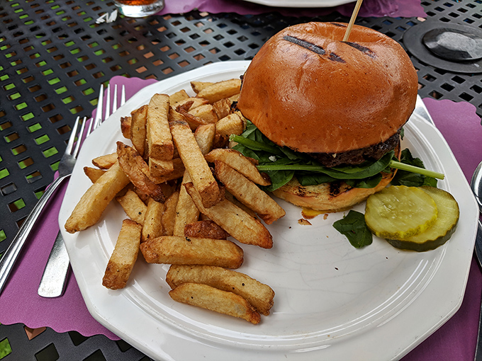 The star of the show: a burger that demands two hands and your full attention, with hand-cut fries that could steal the spotlight on their own.