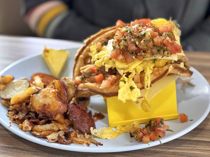 This breakfast taco isn't just a meal &ndash; it's edible architecture, with layers of eggs, fresh pico, and cheese creating a morning masterpiece.