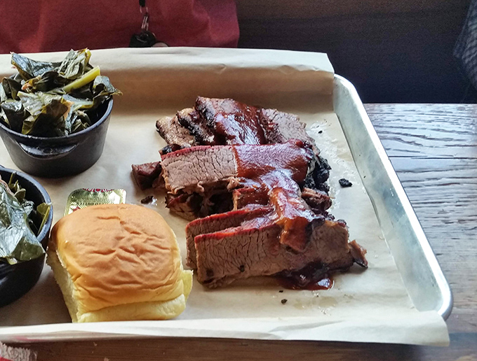 Brisket sliced so perfectly it could make a Texas pitmaster shed a single, dignified tear of respect.