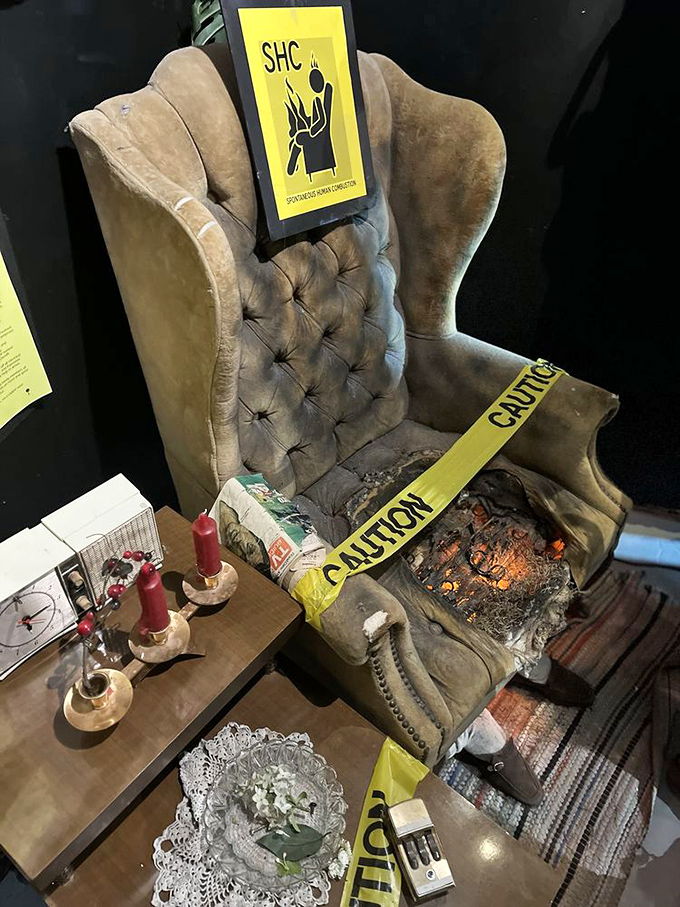 The world's most uninviting easy chair comes complete with caution tape and what appears to be spontaneous combustion.