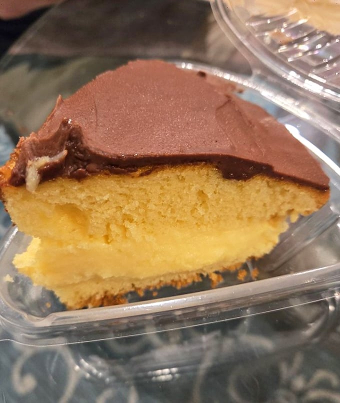 Layer cakes stand tall like edible skyscrapers, each slice a sweet architectural marvel waiting to be explored.