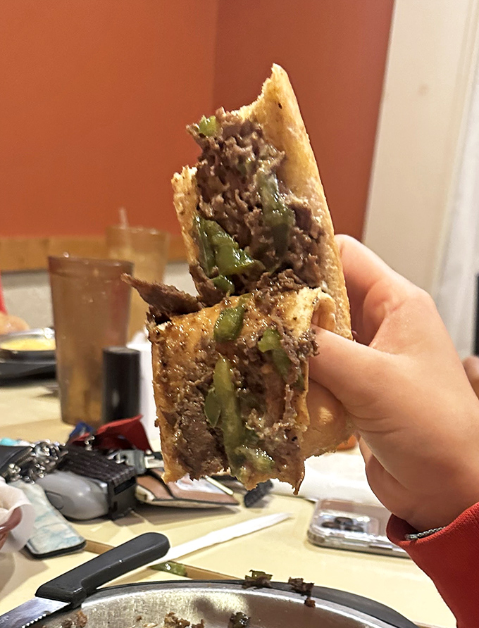 Melted cheese cascades over seasoned beef like a delicious avalanche of comfort food dreams realized.