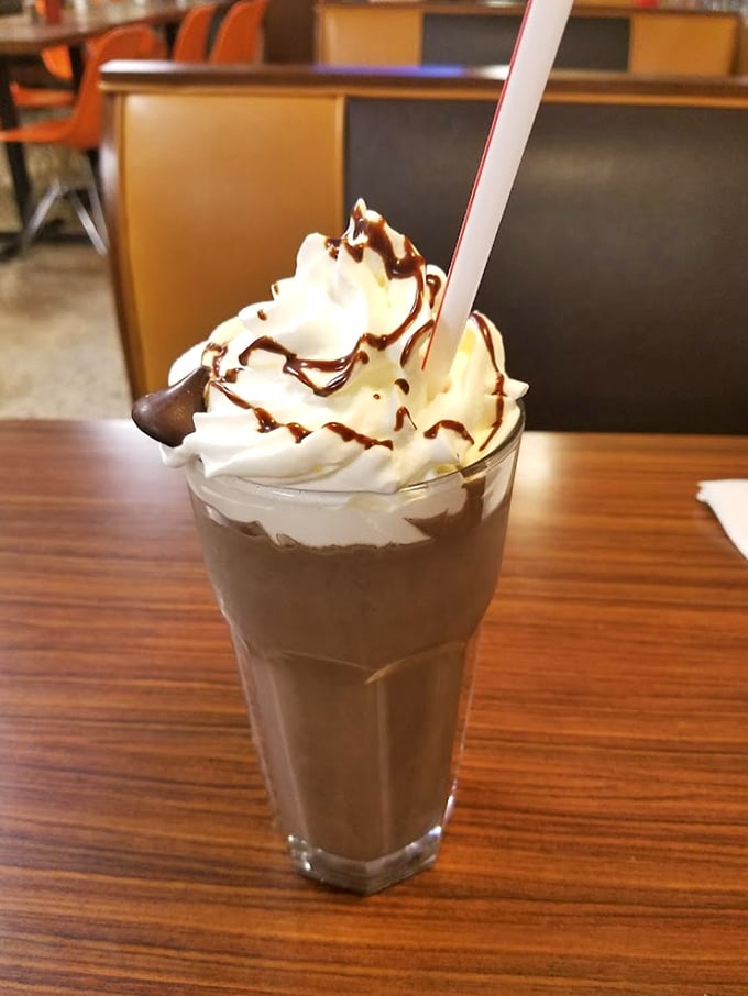 This chocolate shake topped with whipped cream isn't just dessert&mdash;it's what happiness would look like if it took liquid form.