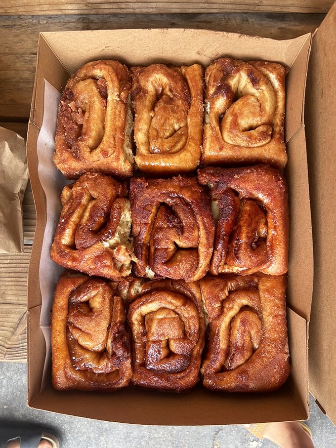 The holy grail of cinnamon roll experiences&mdash;a box of nine perfectly spiraled treasures. This isn't just breakfast; it's an event worth planning your day around.