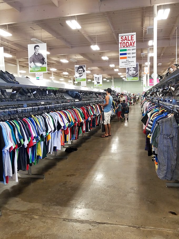 The men's department stretches to the horizon like a sea of potential wardrobe upgrades. Color-coding: the unsung hero of thrift organization.