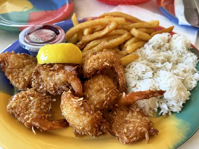 Coconut shrimp that would make Tom Hanks' Castaway character weep with joy&mdash;golden-crisp outsides giving way to tender seafood, with rice and fries as worthy companions.