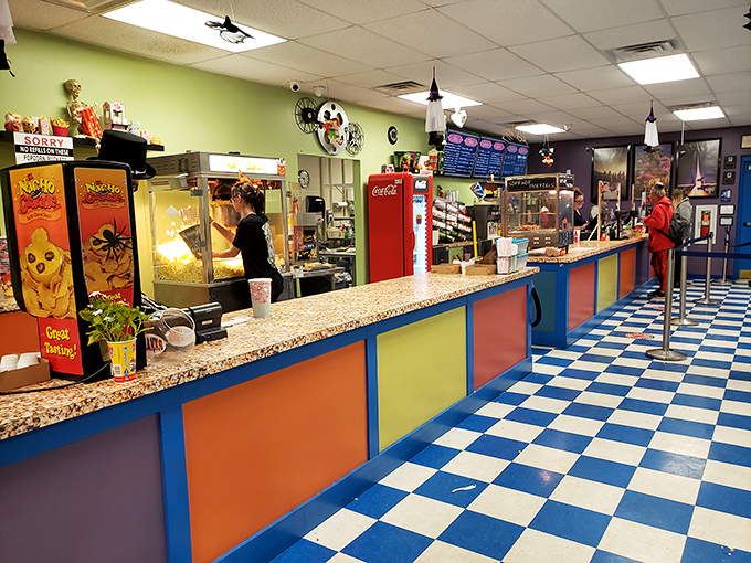 Concession stand heaven with its checkerboard floor and rainbow-colored counter. Where movie snacks aren't just food&mdash;they're supporting characters in your evening's story.