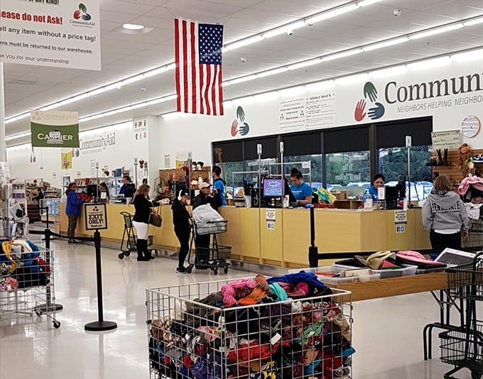 The checkout area&mdash;where American flags hang proudly and yellow counters welcome shoppers whose carts contain someone else's memories and their own new possibilities.