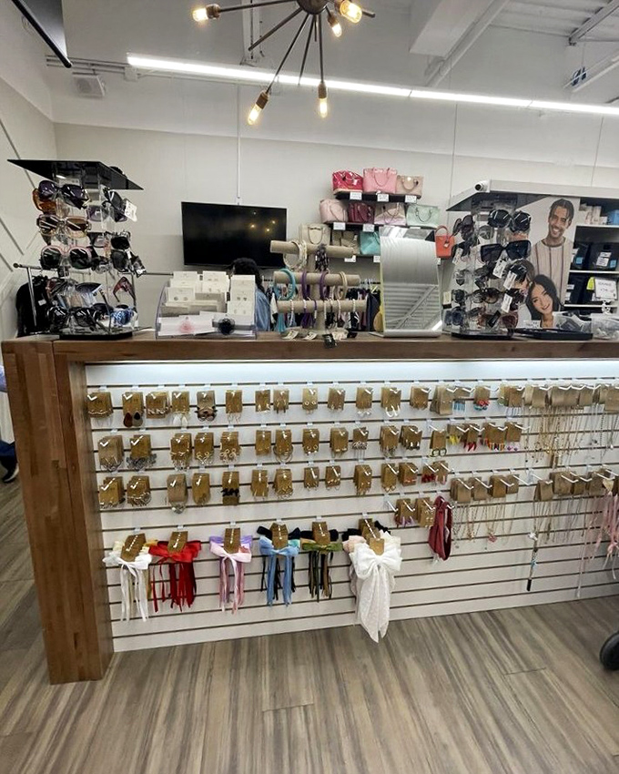 The accessories counter—where earrings, sunglasses, and jewelry await their chance to transform "nice outfit" into "where did you get that?!"