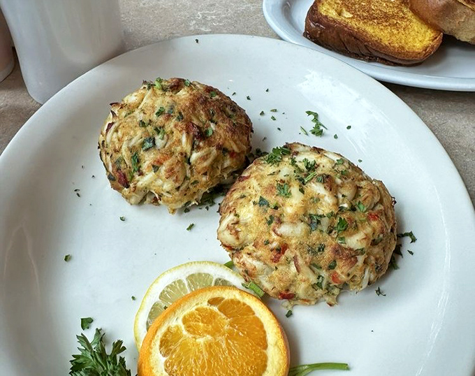 These golden crab cakes bring Maryland's coastal treasures right to your table with every flaky, delicious bite.