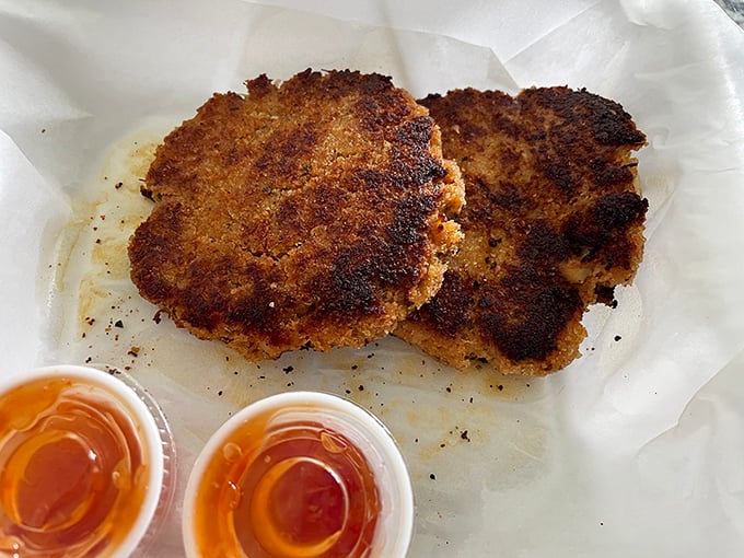 Crab cakes with more crab than cake&mdash;a revolutionary concept that deserves its own national holiday. Two dipping sauces because life is about choices.