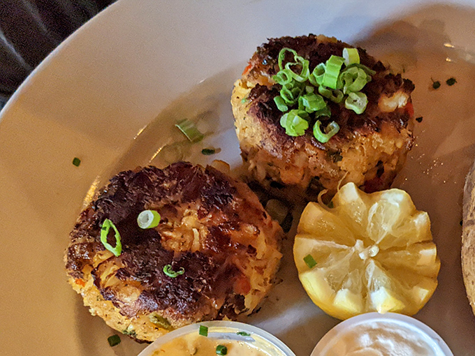 Crab cakes with a golden crust that audibly crackles with each bite. No filler fuss here&mdash;just sweet crab meat that tastes like the Chesapeake came to the mountains.
