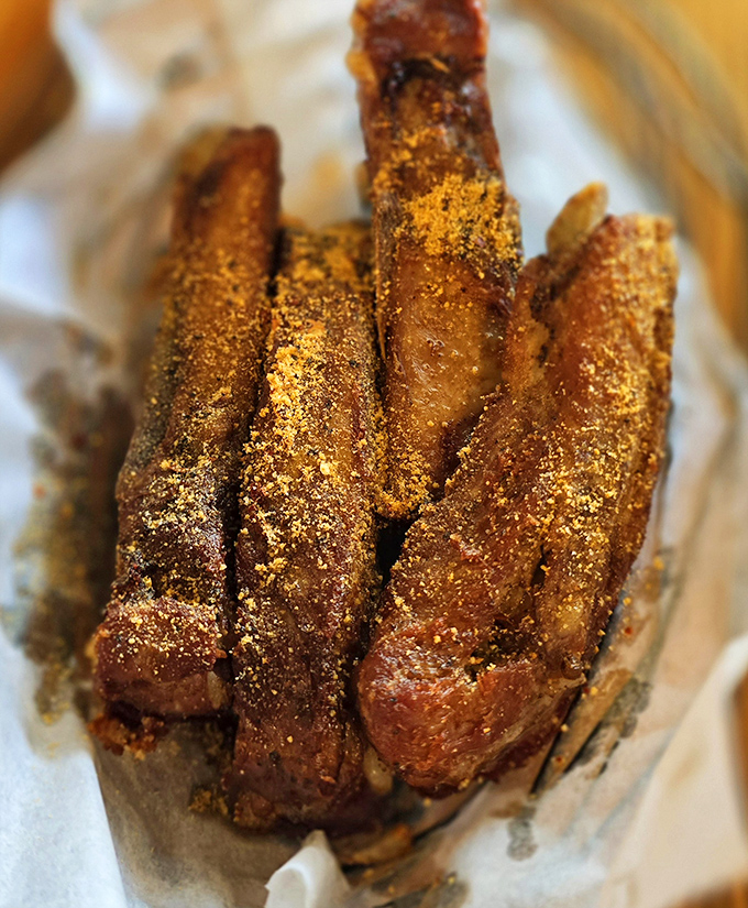 These aren't just ribs; they're meat candy. Dusted with seasoning that creates a crust so good you'll be licking your fingers without shame.
