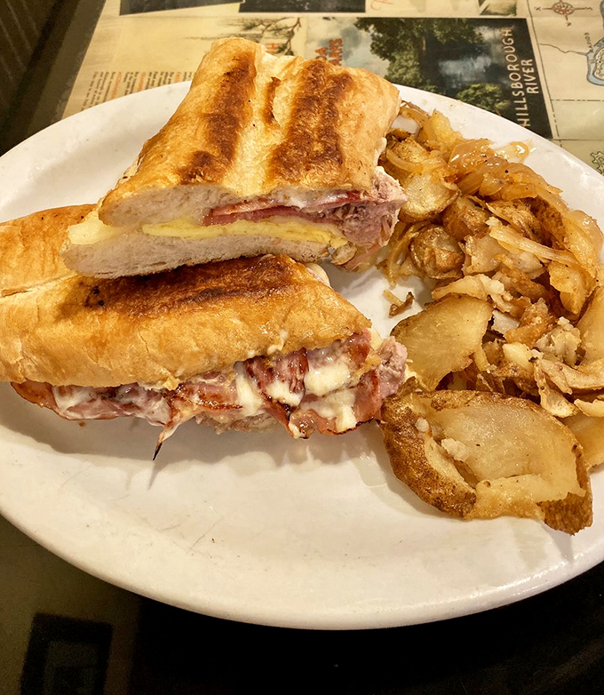 This Cuban sandwich isn't just lunch &ndash; it's a Florida tradition pressed between bread, with melty cheese escaping from the sides like delicious lava.