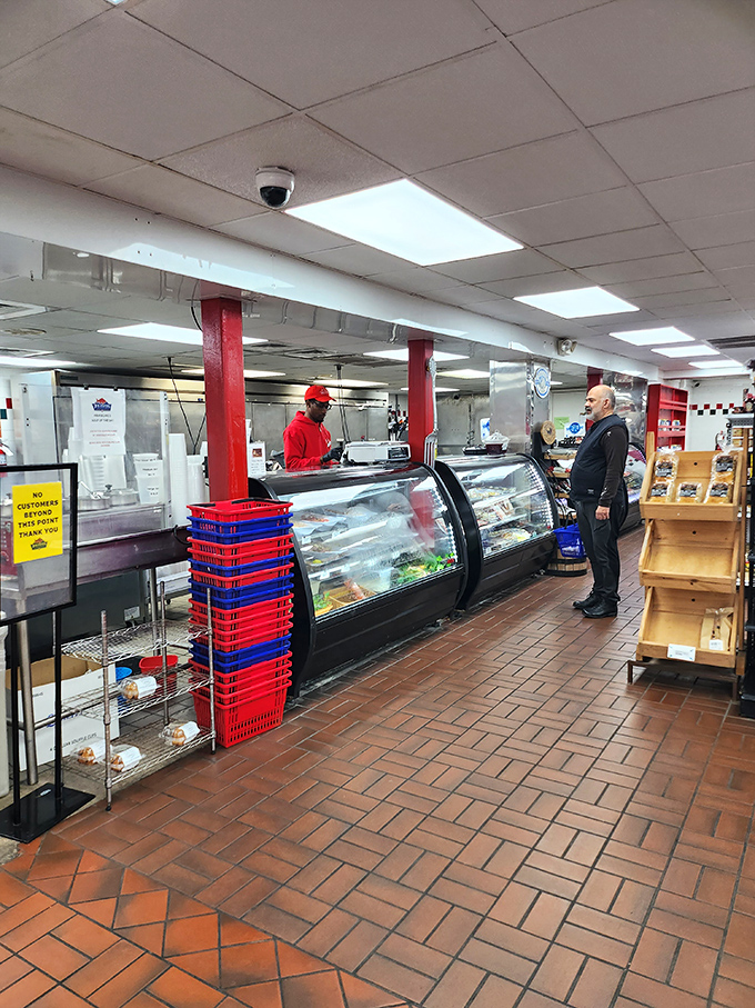 The deli counter stands ready to serve those who prefer their seafood adventure without the cooking part. Smart shoppers indeed.