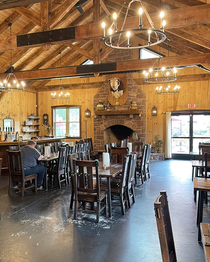 The dining room where carnivorous dreams come true, beneath chandeliers that cast a glow warm enough to rival the smokers out back.
