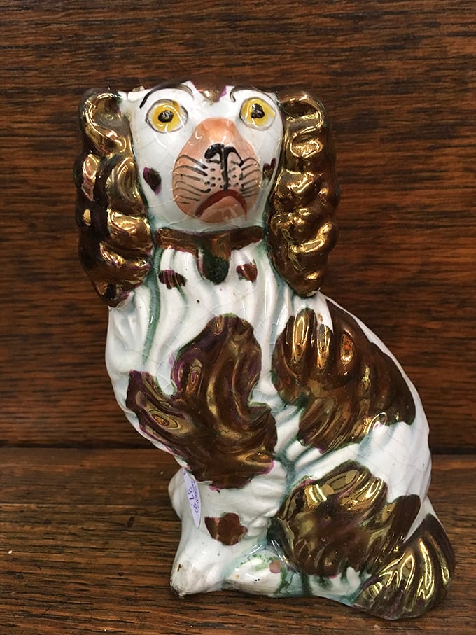 The world's most judgmental ceramic dog, with eyes that follow you around the room. Someone's grandmother definitely cherished this quirky companion.