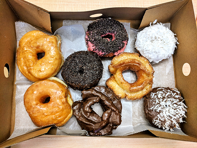 A box of VG's donuts is like a treasure chest for grown-ups, each selection promising its own unique sugar-coated adventure.