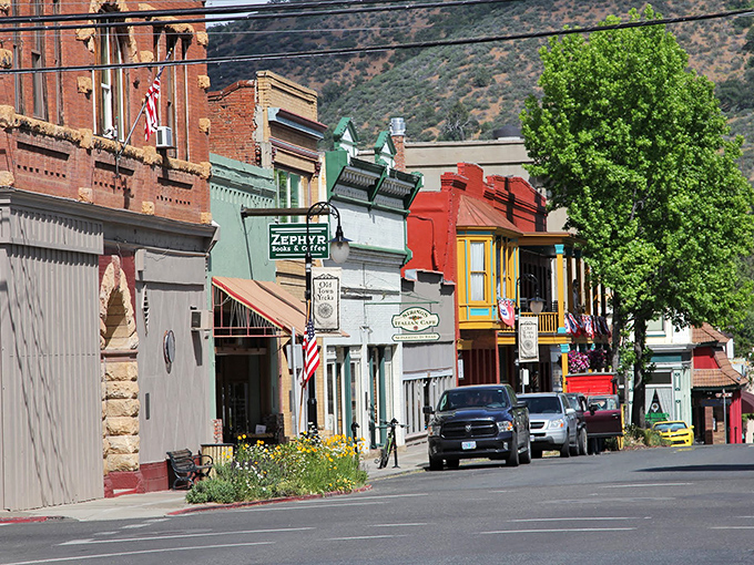 Colorful storefronts pop against mountain backdrops, creating a downtown that's equal parts functional and frame-worthy. Norman Rockwell would approve.