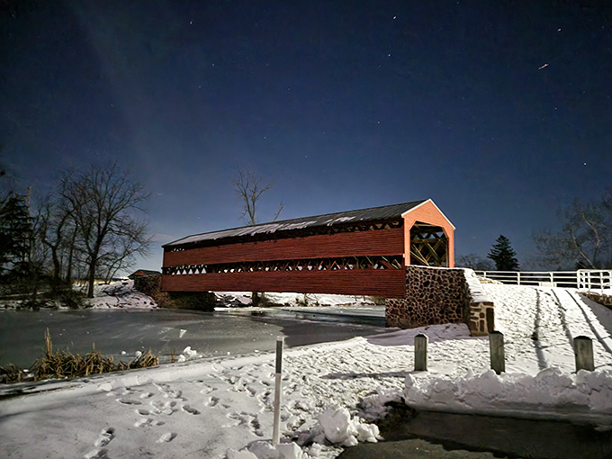 Under starlit skies, the bridge takes on an ethereal quality. Is that a ghostly mist or just your breath in winter air? You decide.