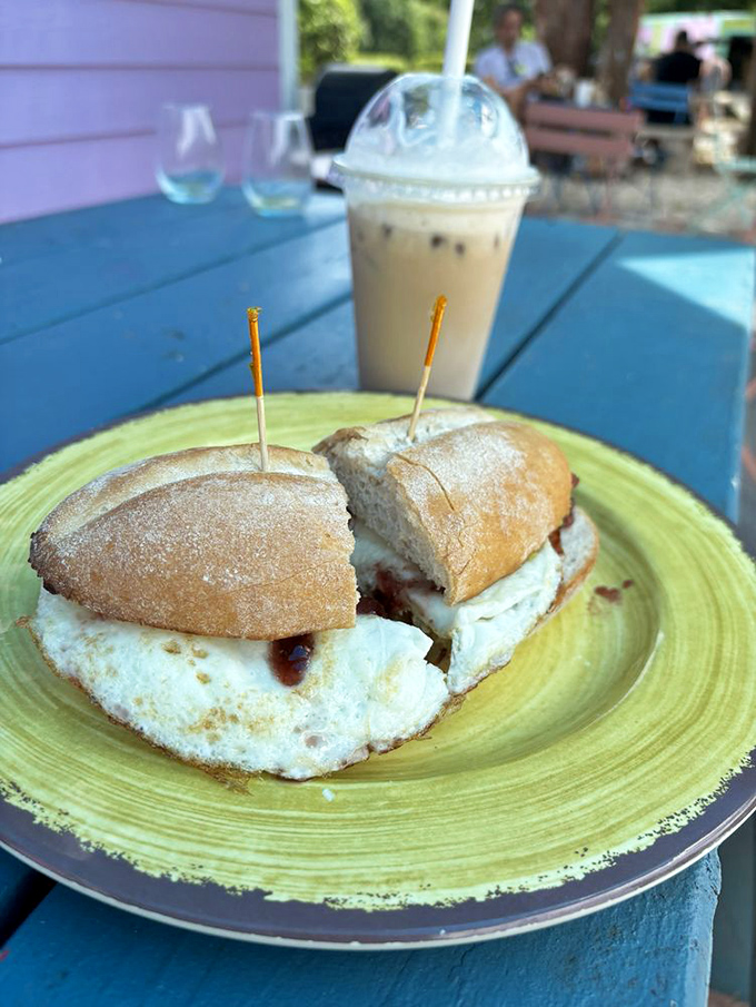 Breakfast architecture at its finest. This egg and brie sandwich on crusty bread proves that sometimes the simplest combinations create the most profound flavors.