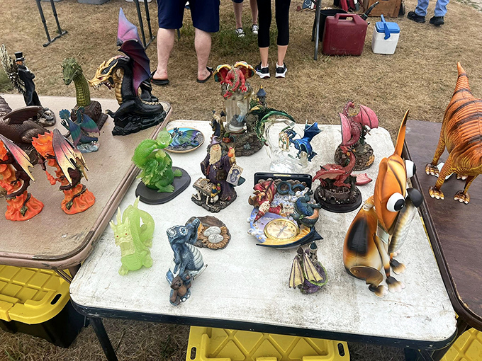 Dragons, dinosaurs, and fantasy creatures galore! This table of figurines proves one shopper's kitsch is another's must-have collectible. 