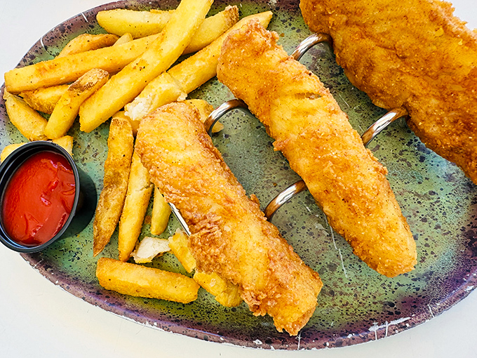 Fish and chips done right&mdash;golden, crispy perfection on the outside, flaky tenderness within, and fries that deserve their own fan club.