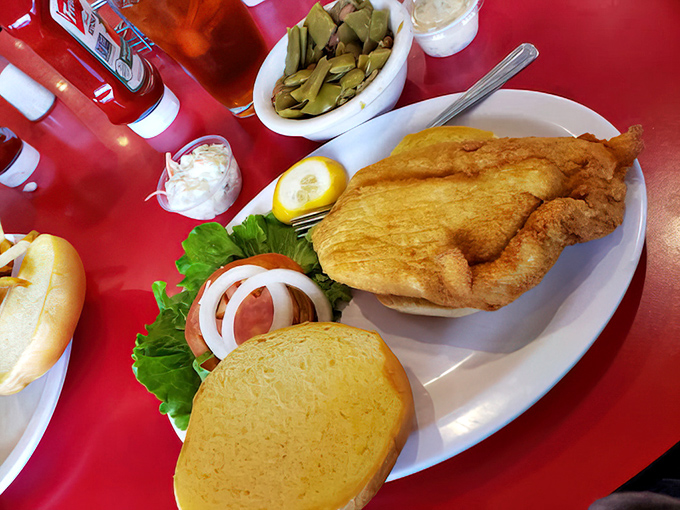 Golden fried fish sandwich that proves sometimes the simplest pleasures deliver the most extraordinary experiences in life.
