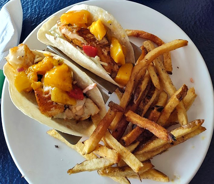 Fish tacos with mango salsa and hand-cut fries&mdash;proof that sometimes the simplest pleasures deliver the most profound satisfaction.