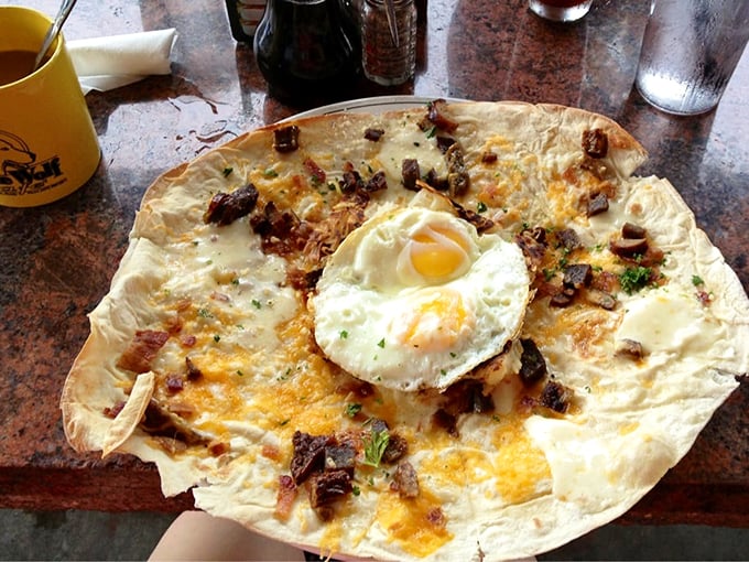 Who needs pizza when you can have this flatbread topped with cheese, bacon bits, and a sunny-side-up egg that breaks into liquid gold when pierced?