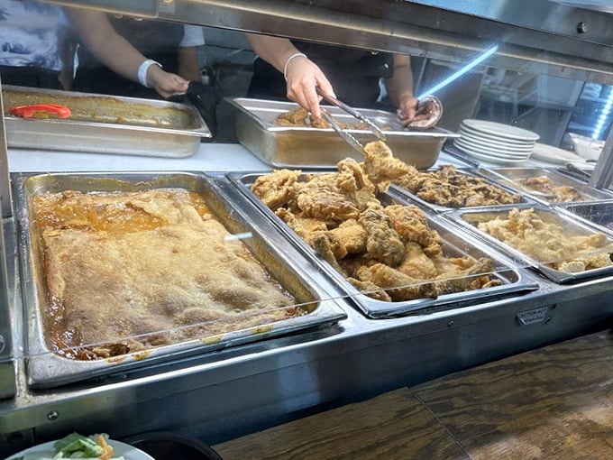 Steam table treasures await as golden-fried chicken gets the VIP treatment it deserves &ndash; crispy on the outside, juicy salvation within.