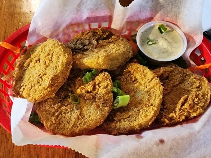 Golden-fried perfection with a side of dipping sauce. These crispy delights are worth every minute of the weekend wait.