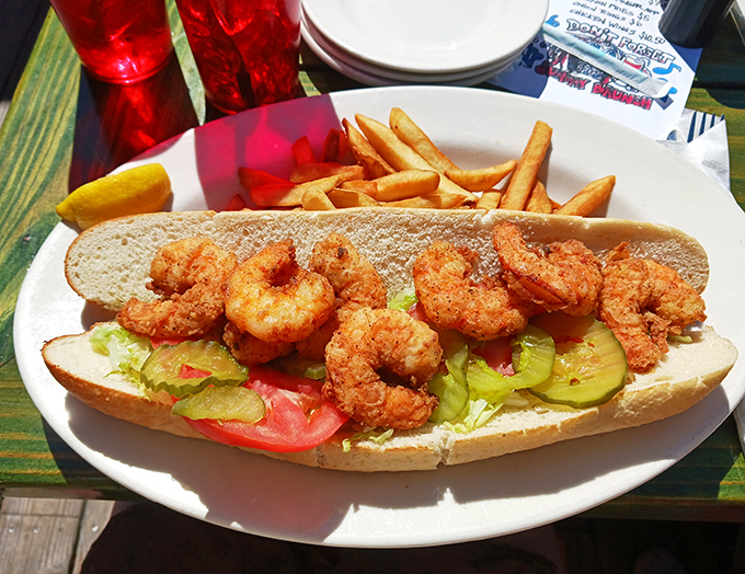 A po'boy that's anything but poor in flavor. Those crispy fried shrimp are practically jumping off the French bread into flavor paradise.